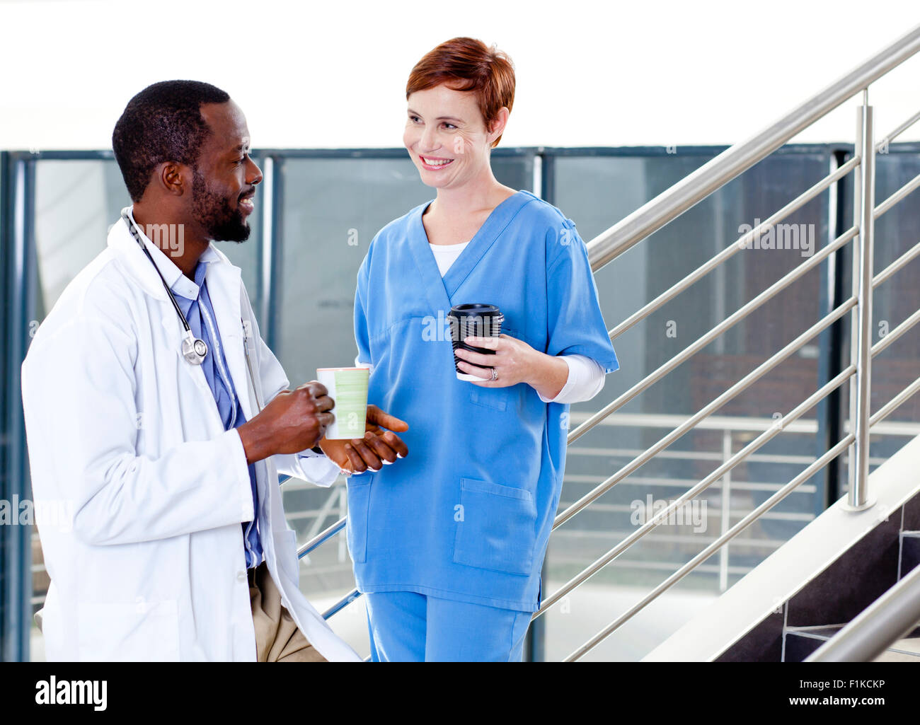 Doctor talking old woman hi-res stock photography and images - Alamy