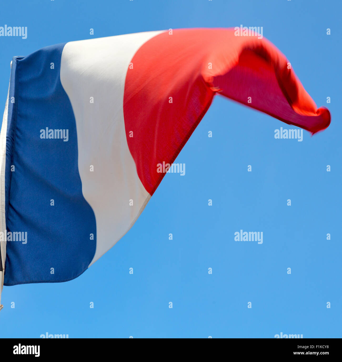 waving flag in the blue sky france colour and wave Stock Photo - Alamy