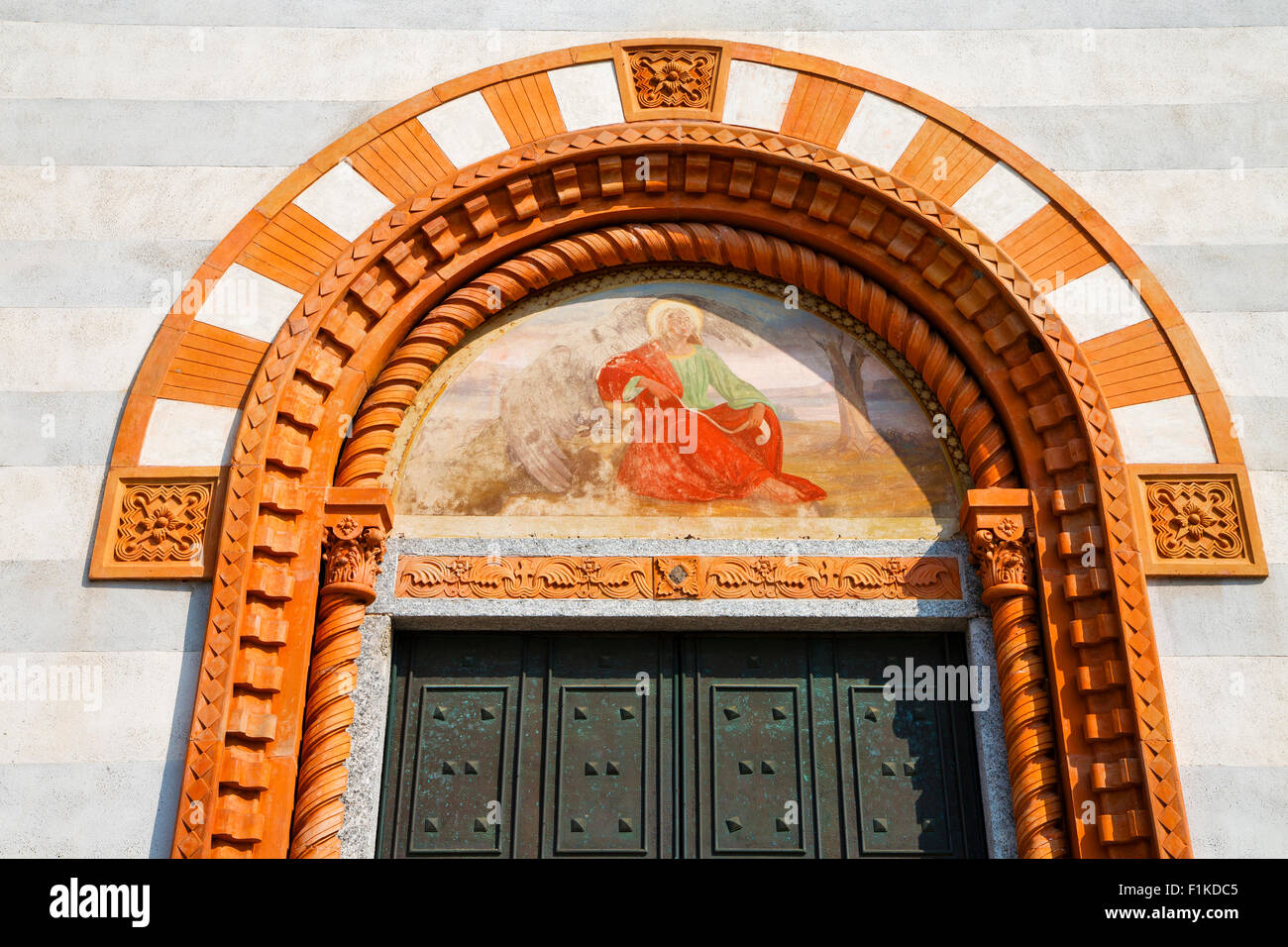 church door in italy lombardy column the milano old closed brick Stock ...