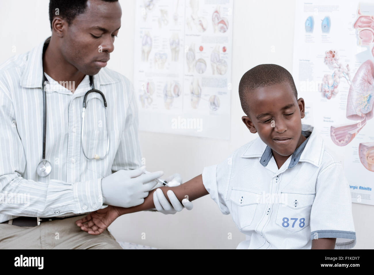 Africa child injection hi-res stock photography and images - Alamy