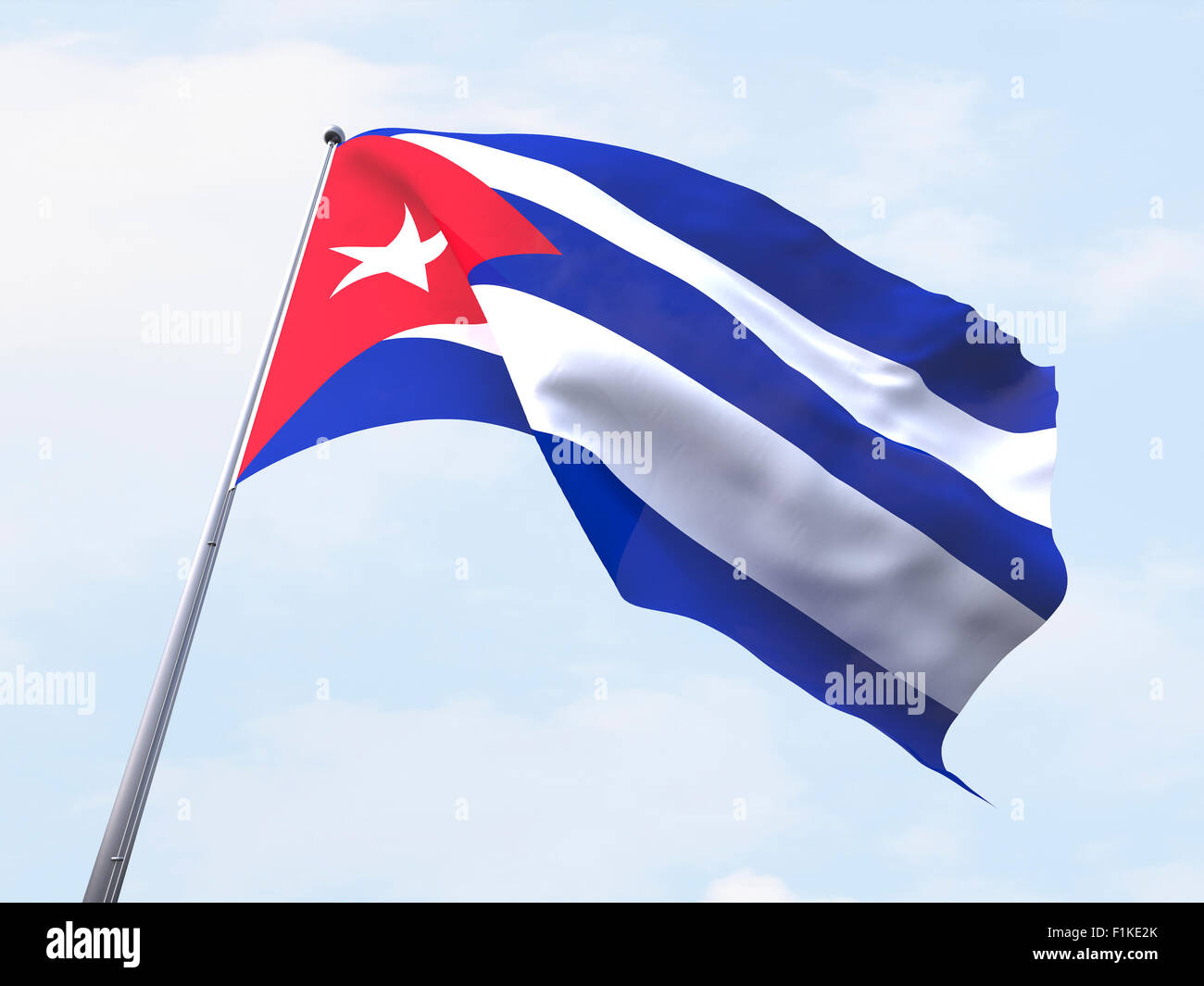Cuba flag flying on clear sky Stock Photo - Alamy