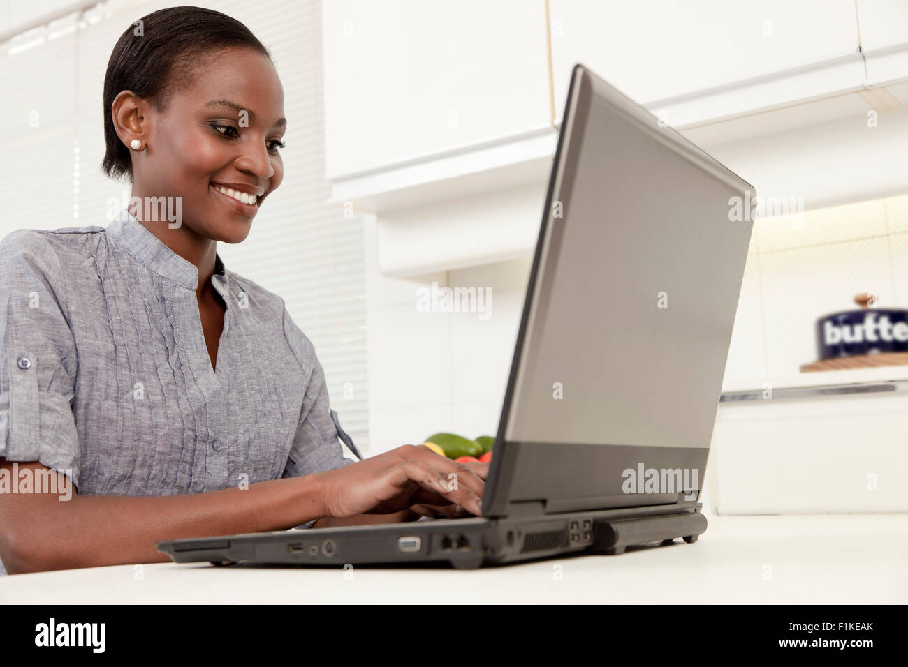 Young african woman working hi-res stock photography and images - Alamy