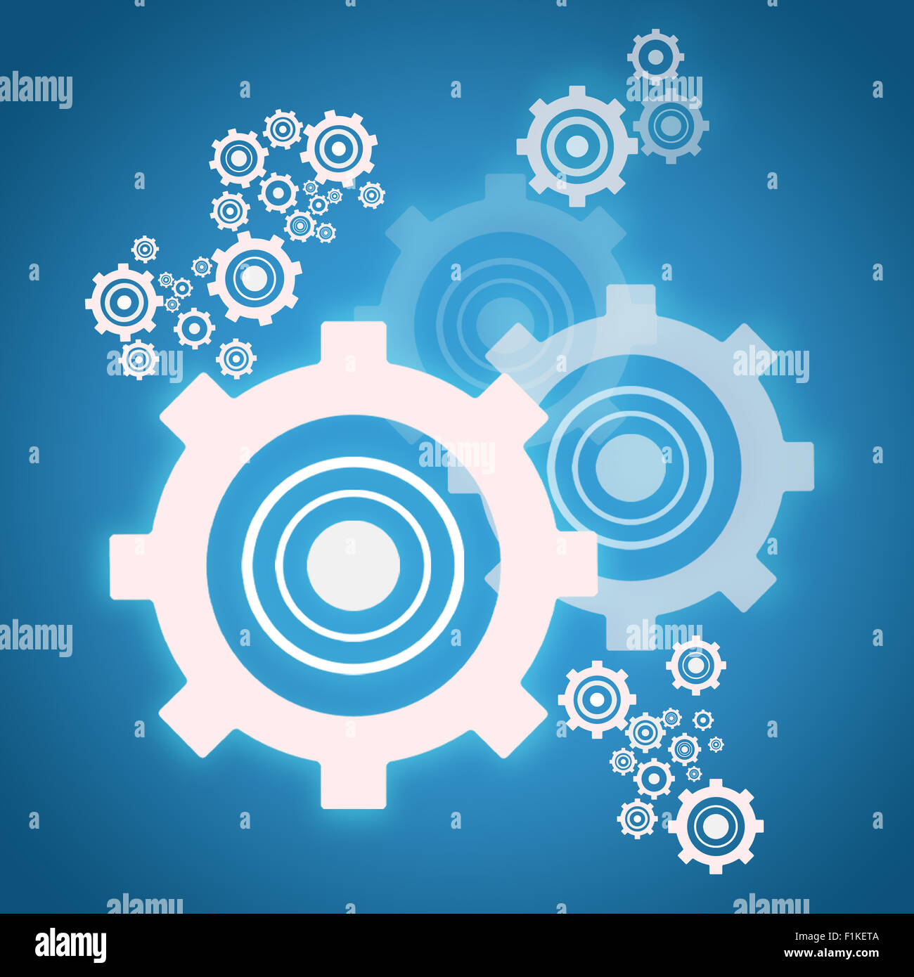 Cog wheels on blue background Stock Photo - Alamy