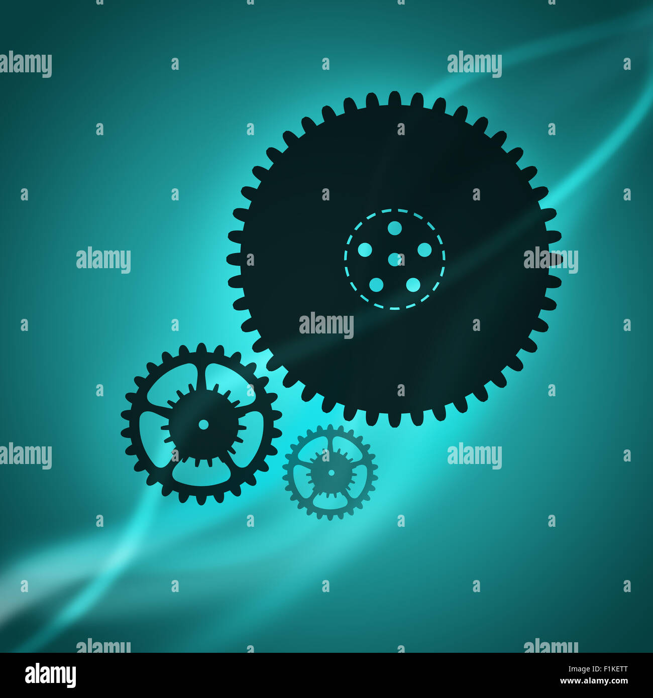 Cog wheels on green Stock Photo - Alamy