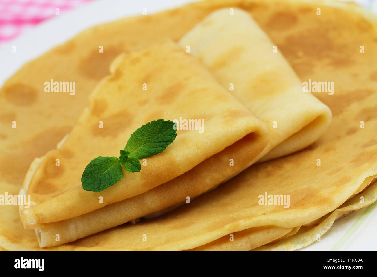 Plain crepes folded, closeup Stock Photo - Alamy