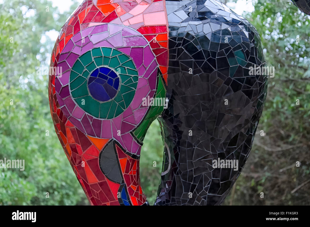 Sculpture of the devil seen from behind Stock Photo - Alamy