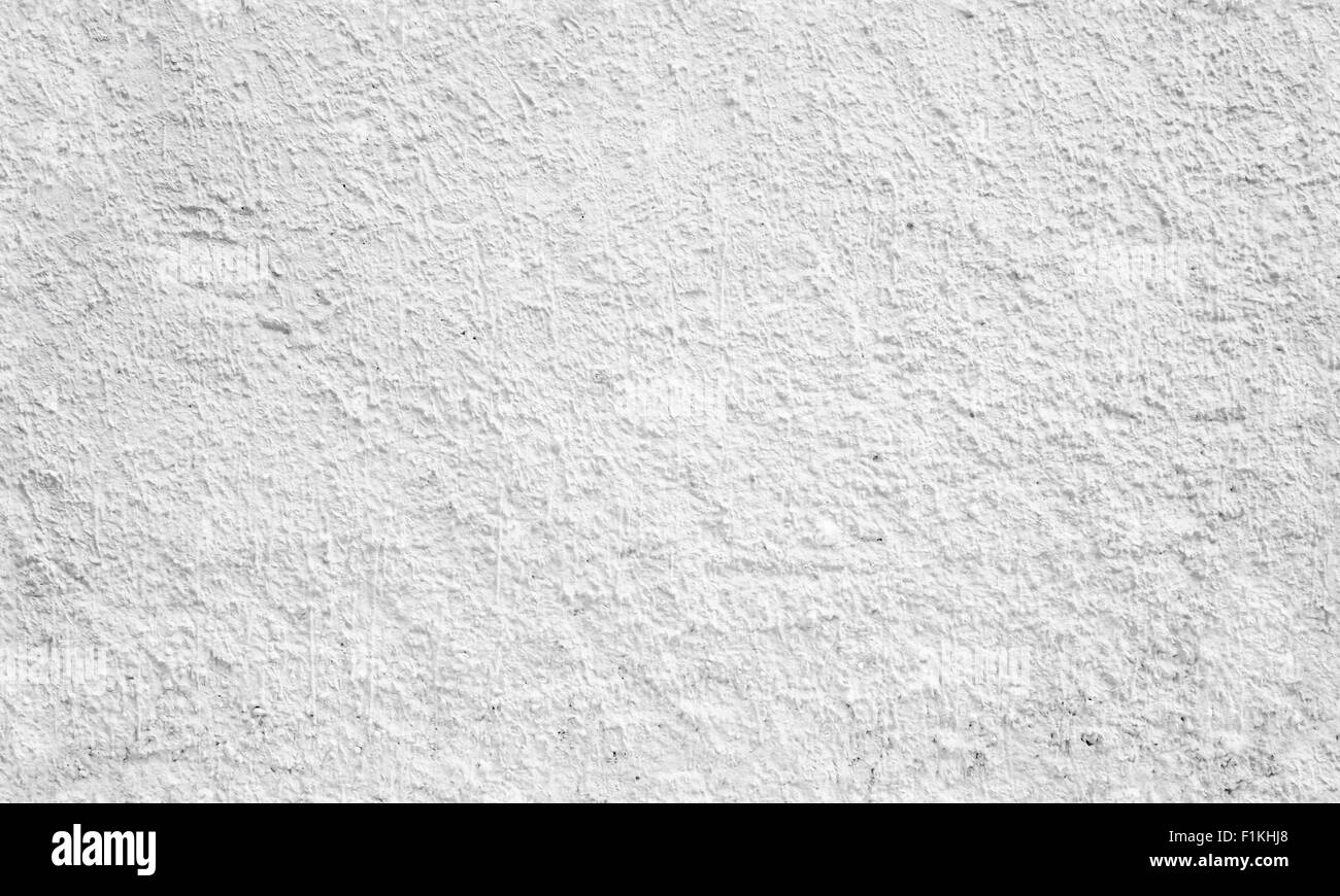 White wall with relief plaster pattern. Seamless background photo ...