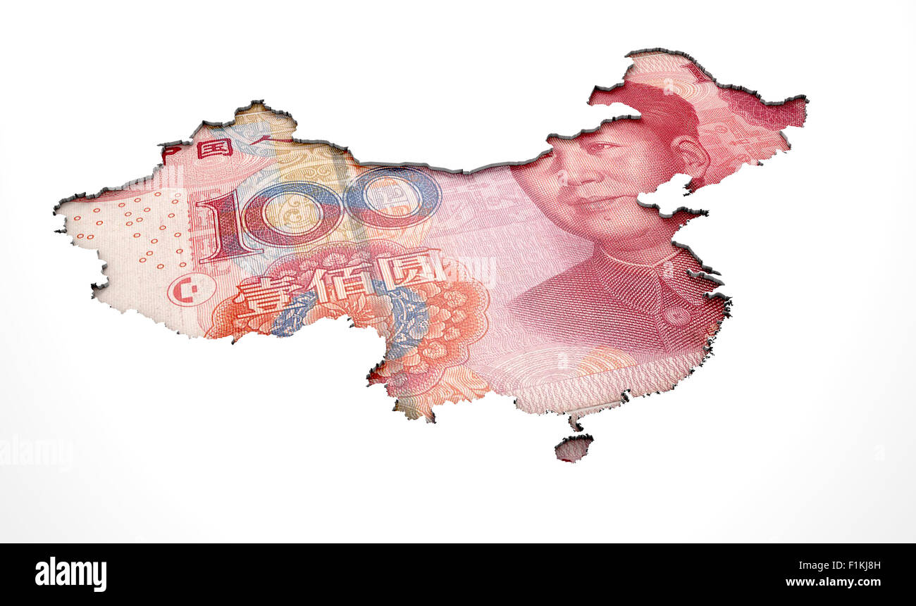 A yuan note in the shape of China recessed into an isolated white ...