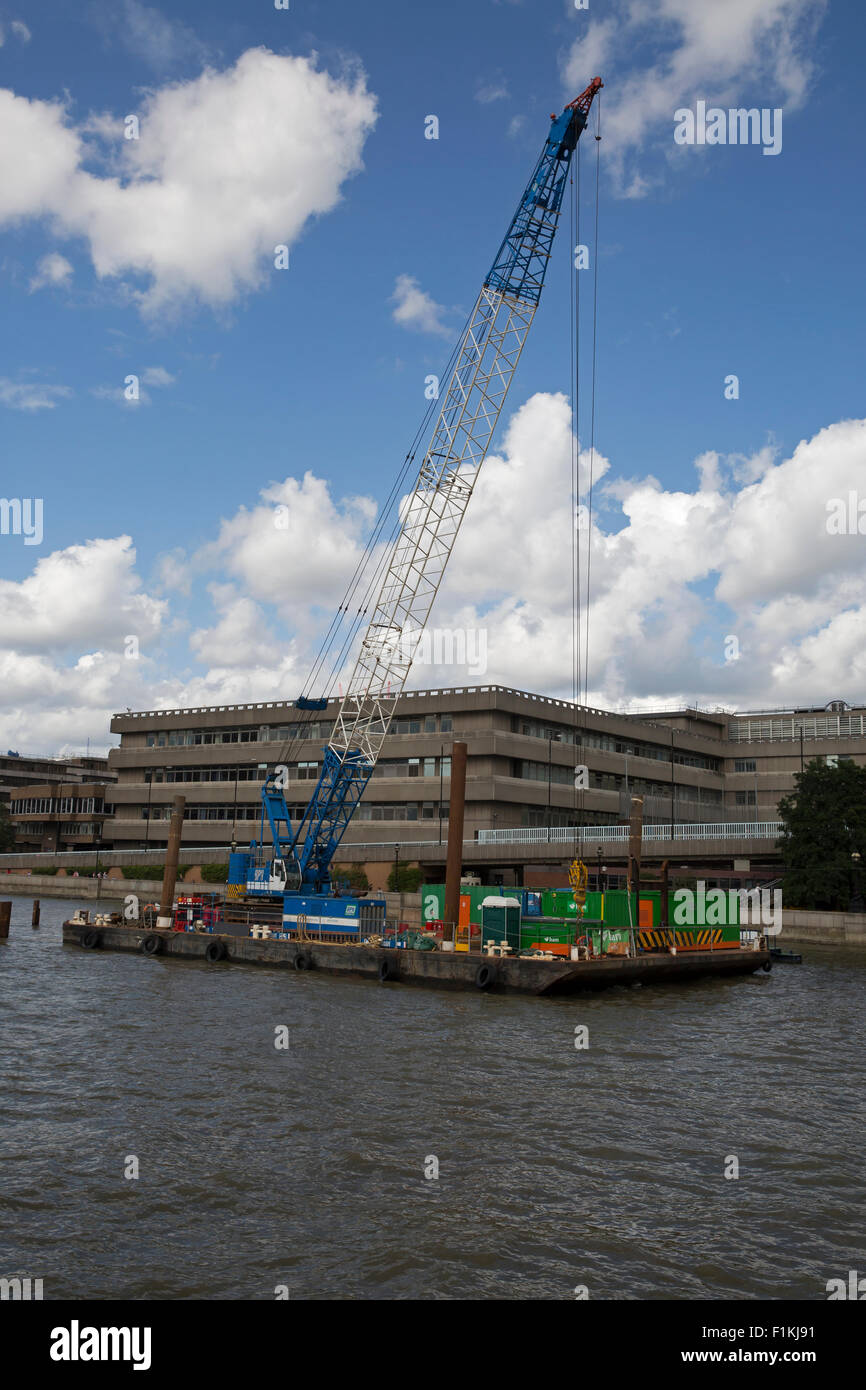 A floating crane on the River Thames in London Stock Photo - Alamy