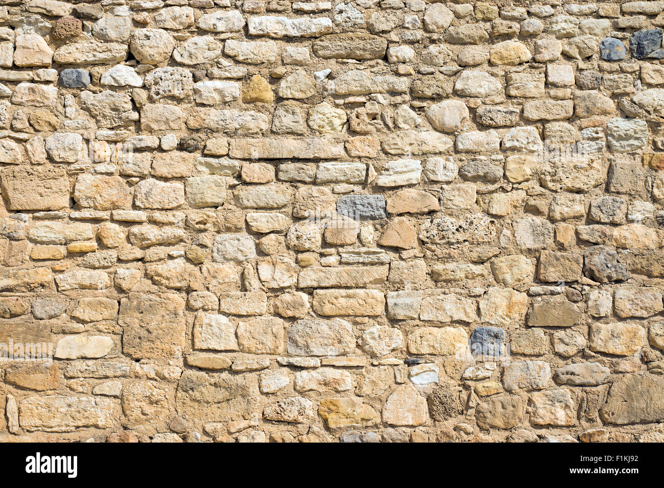 A beautiful ancient stone wall of an old castle Stock Photo - Alamy