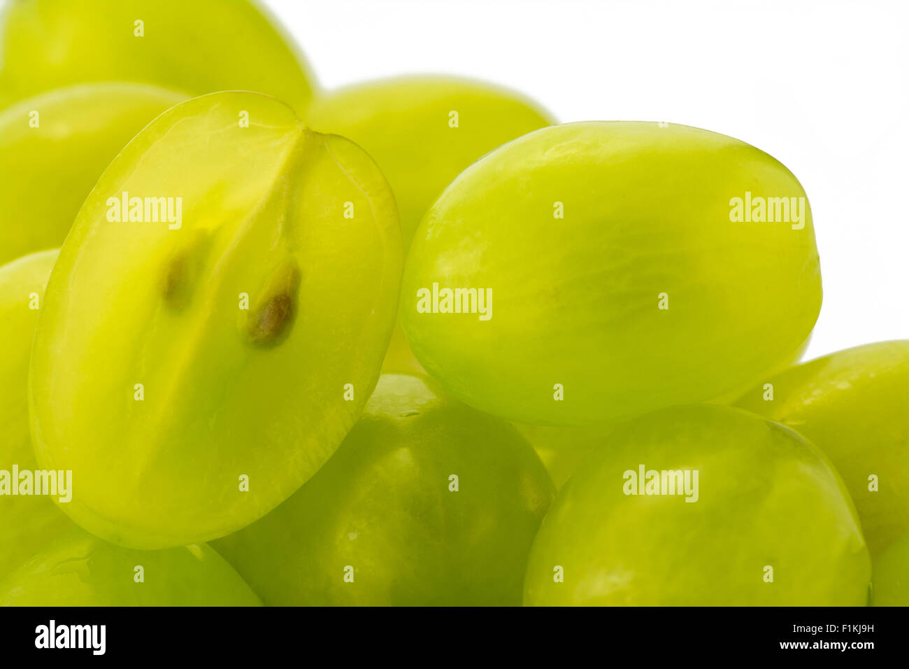 Selective focus of a Close up showing green fresh Juicy grapes with a ...