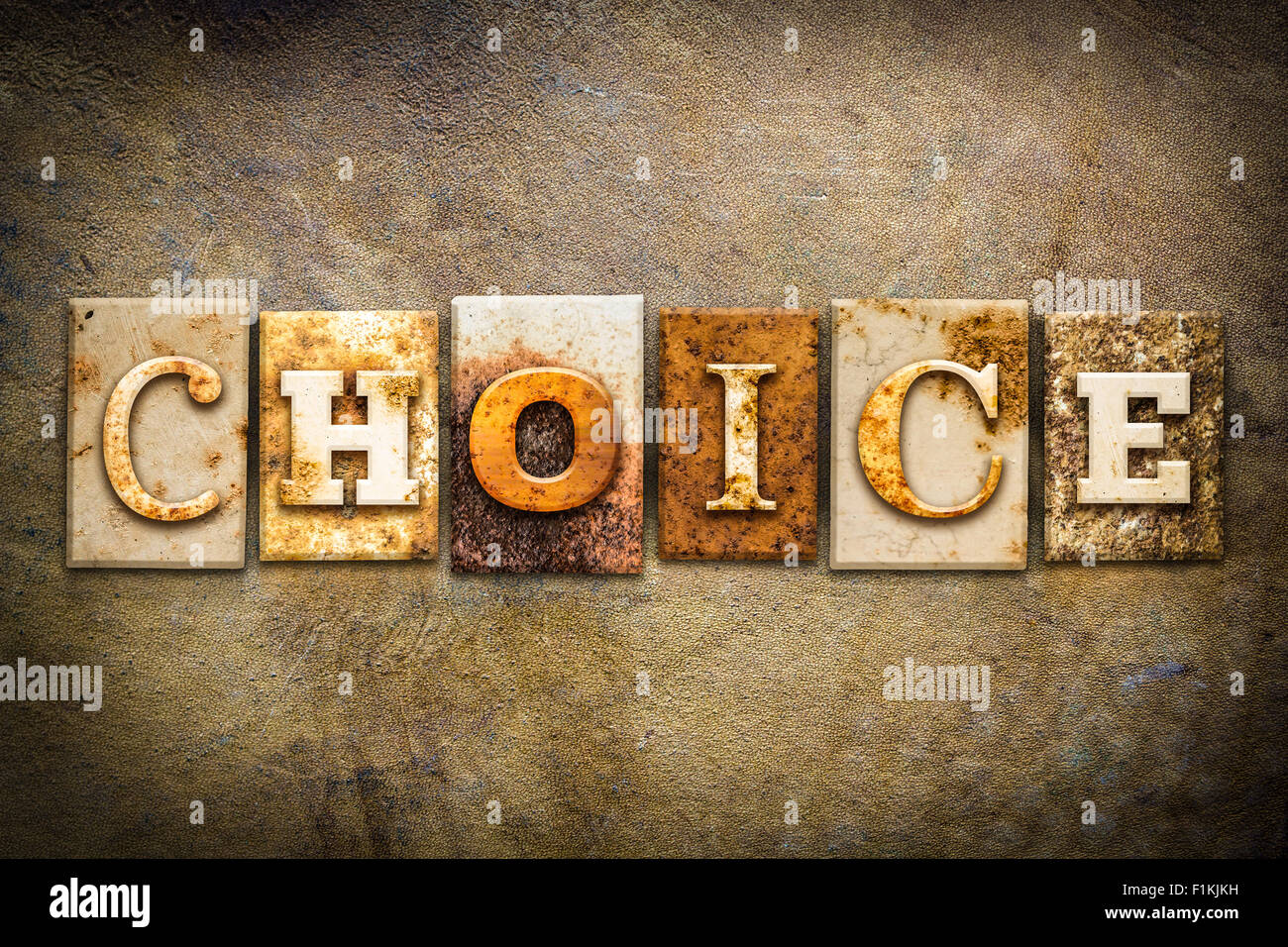 The word "CHOICE" written in rusty metal letterpress type on an old ...