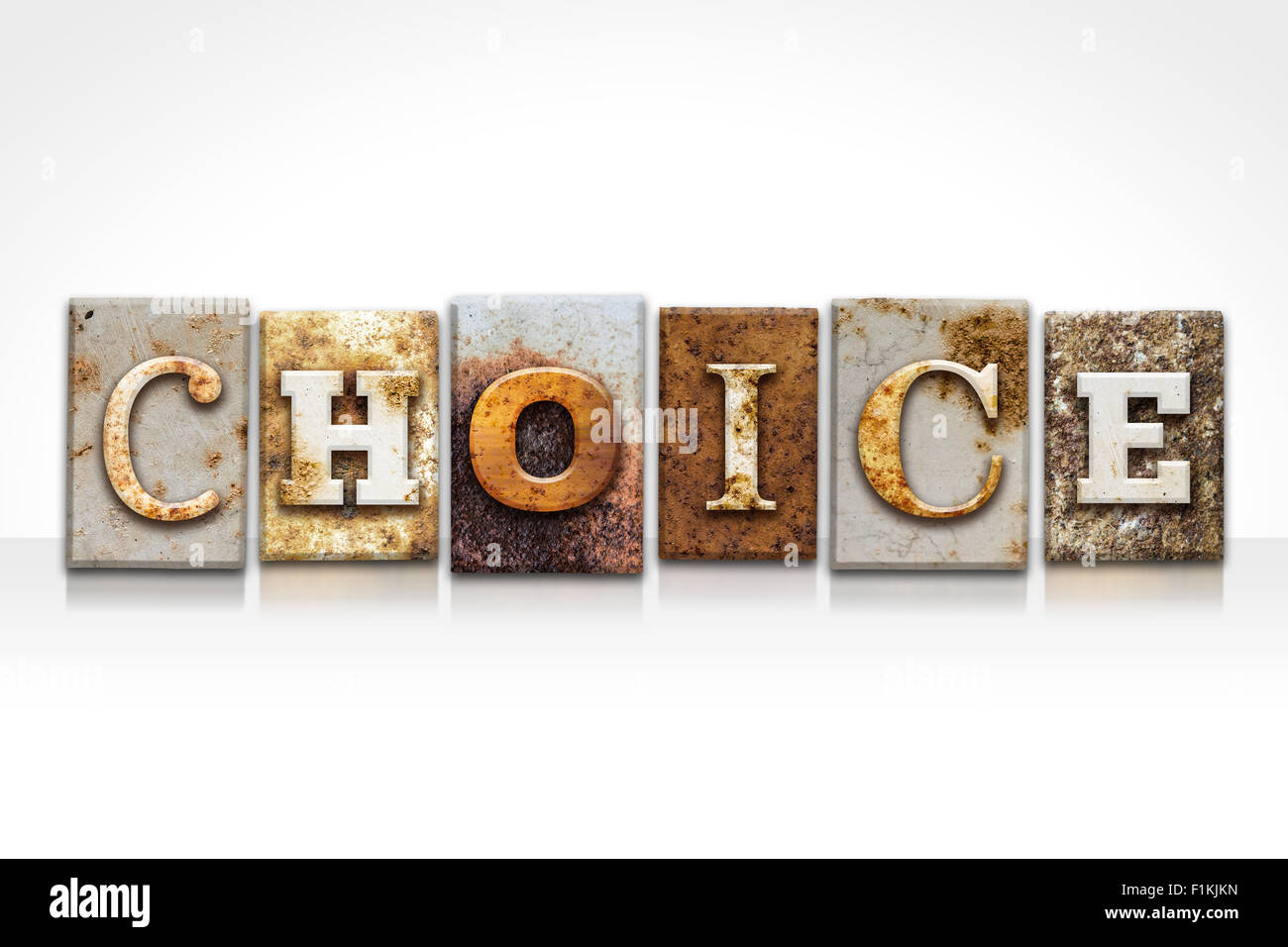 The word "CHOICE" written in rusty metal letterpress type isolated on a ...