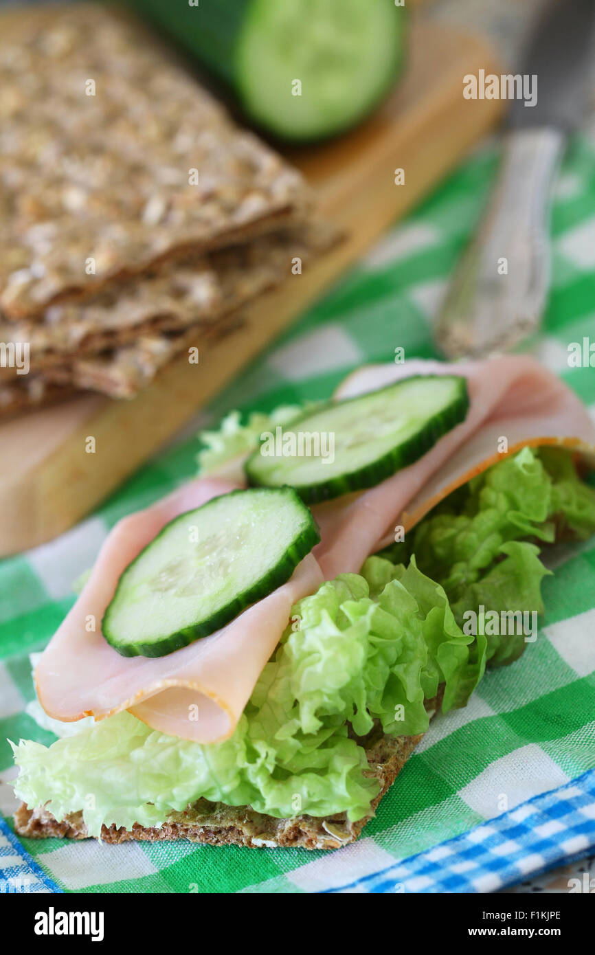 Crisp bread with ham, lettuce and cucumber Stock Photo - Alamy