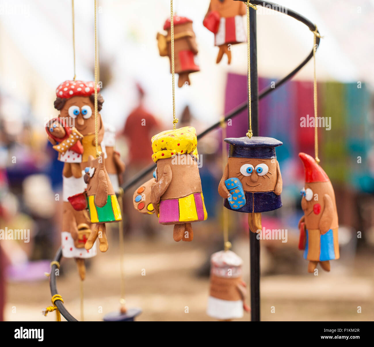 clay toys on a string Stock Photo - Alamy