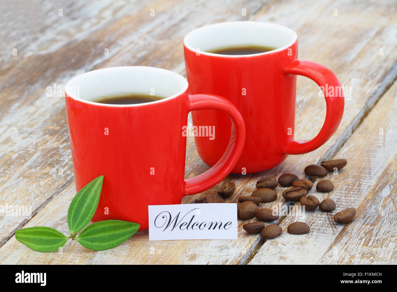 Welcome card with two mugs of coffee on rustic wooden surface Stock ...