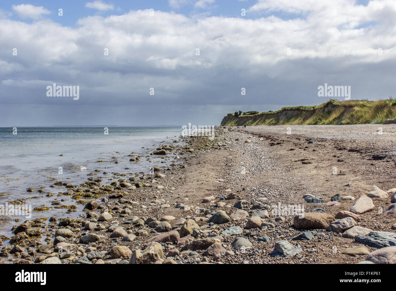 Coastal landscape with stone beach Stock Photo - Alamy