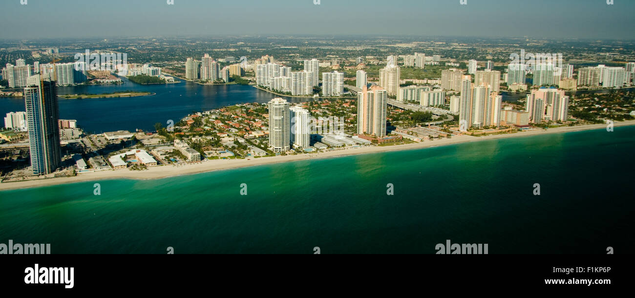 Panoramic view of Miami skyline showing waterfront and calm sea ...
