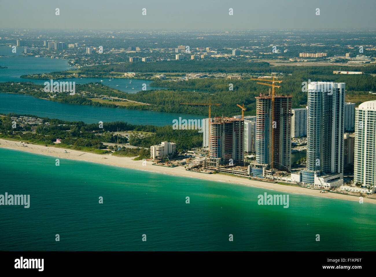 Aerial view of buildings in a city at the waterfront, Miami, Miami-Dade ...