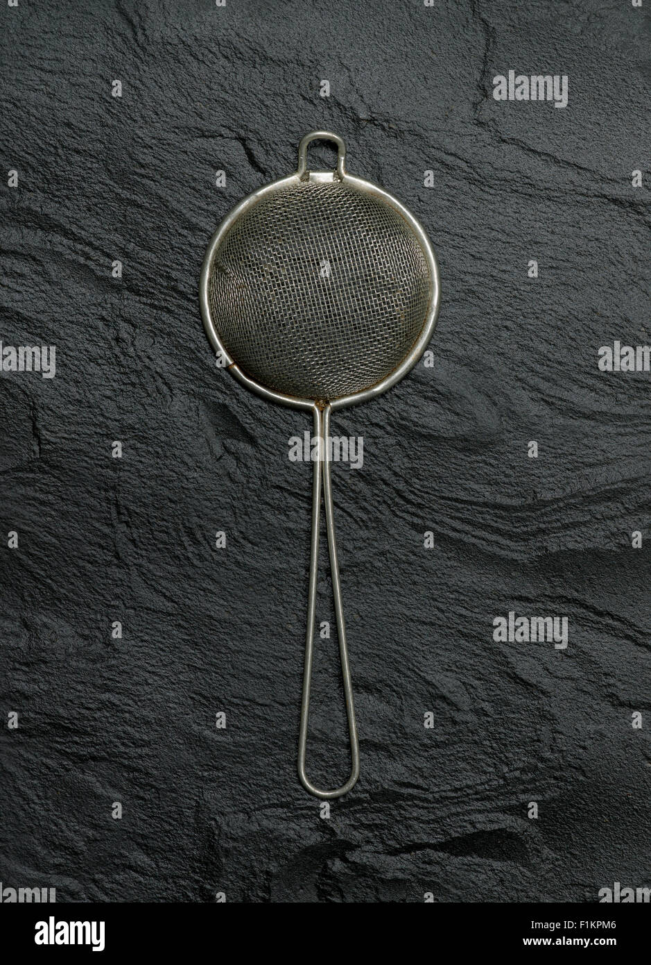 Old vintage kitchen strainer sieve hi-res stock photography and images ...