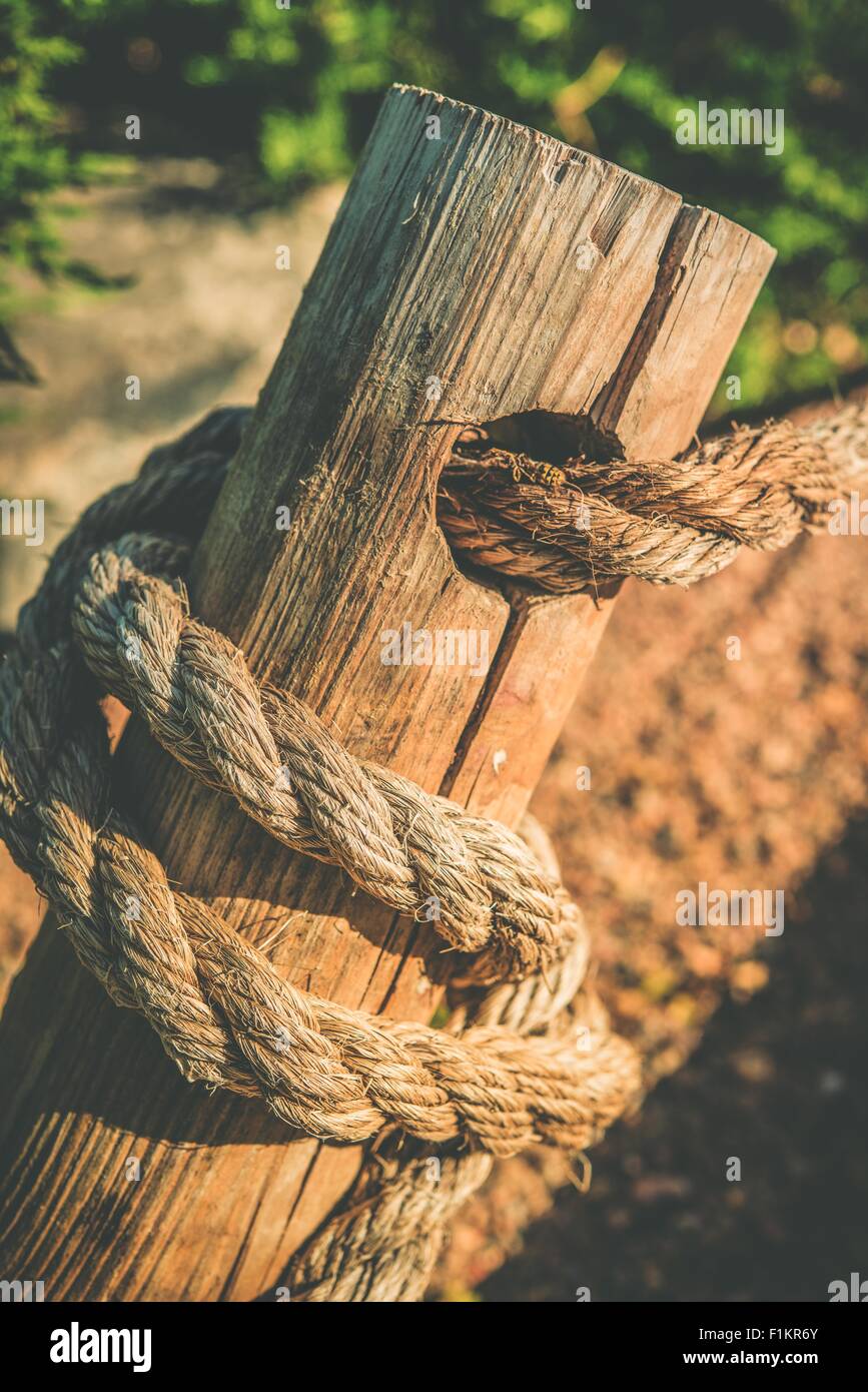 Rope and Wood. Wooden Pole and Rope. Part of Decorative Garden Fence ...