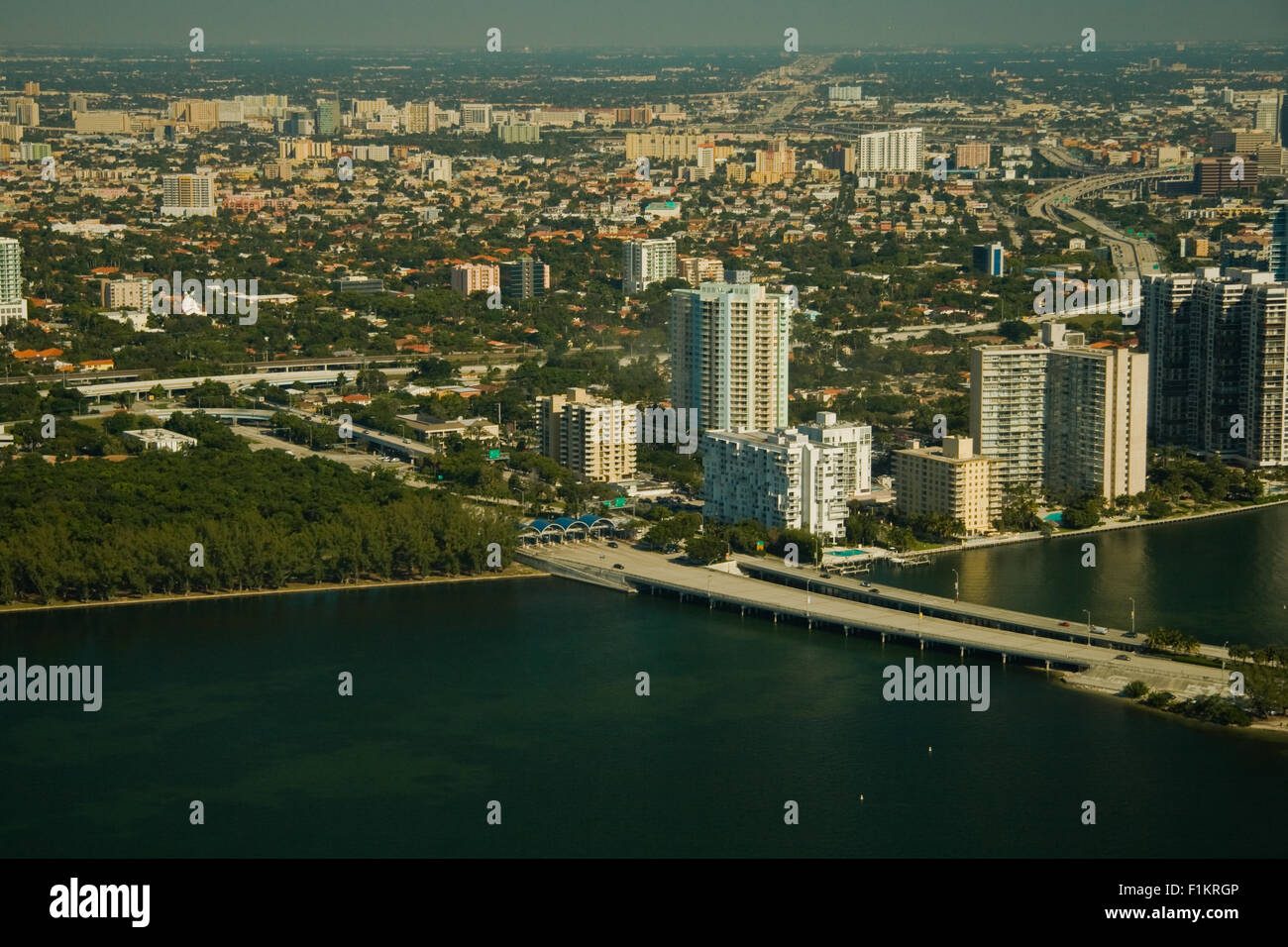 Aerial view of buildings in a city at the waterfront, Miami, Miami-Dade ...