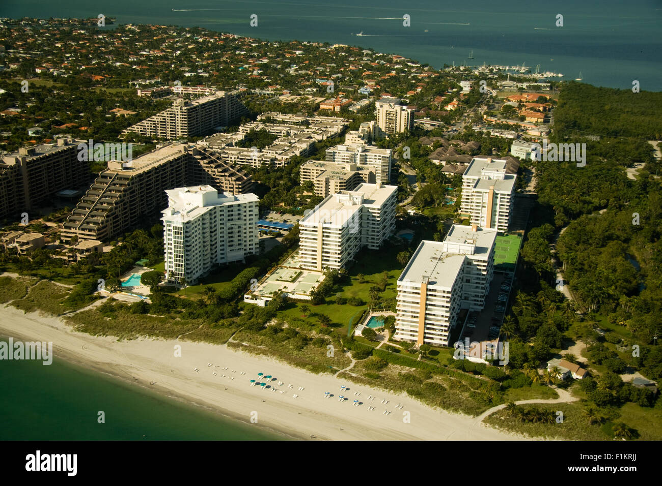 Aerial view of buildings in a city at the waterfront, Miami, Miami-Dade ...