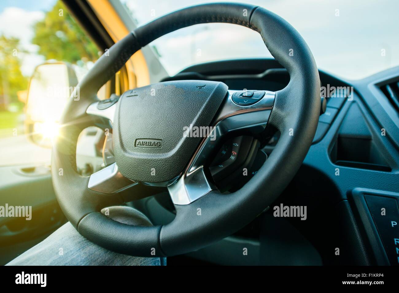 Modern Steering Wheel in a Van. Cargo Van Cockpit Stock Photo - Alamy