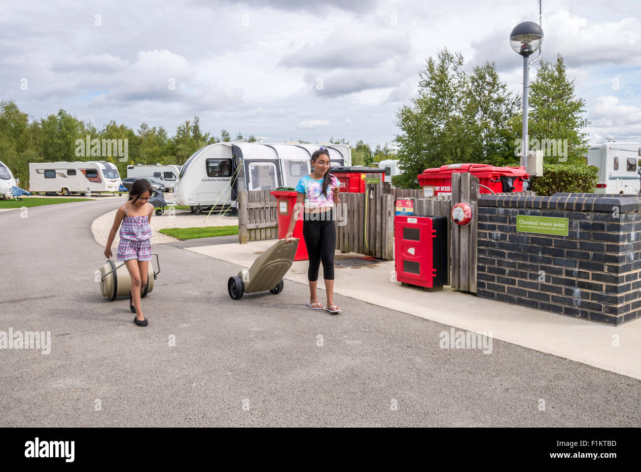 Kids helping in a caravan park, Peak District, UK Stock Photo - Alamy