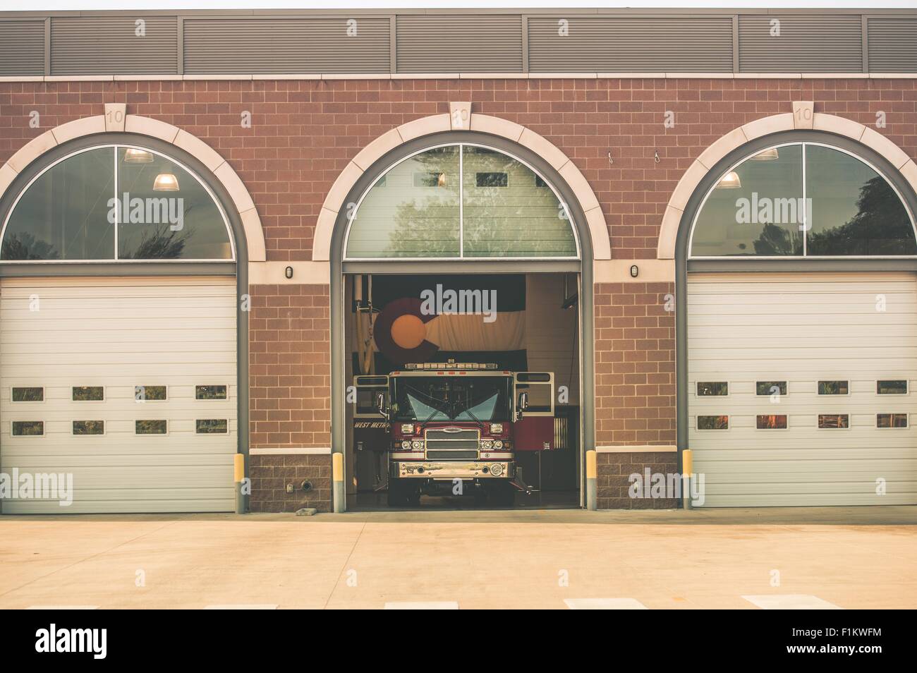 Firefighters of Colorado. Fire Truck inside Firehouse. Large Colorado ...