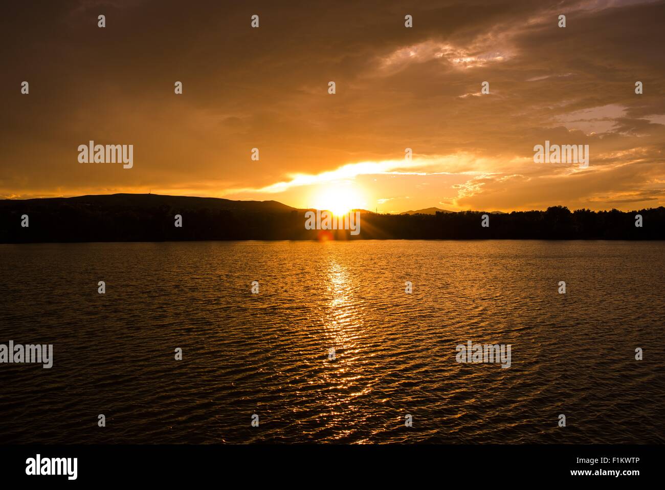 Colorado Lake Sunset with Mountain Range in the Background. Summer ...