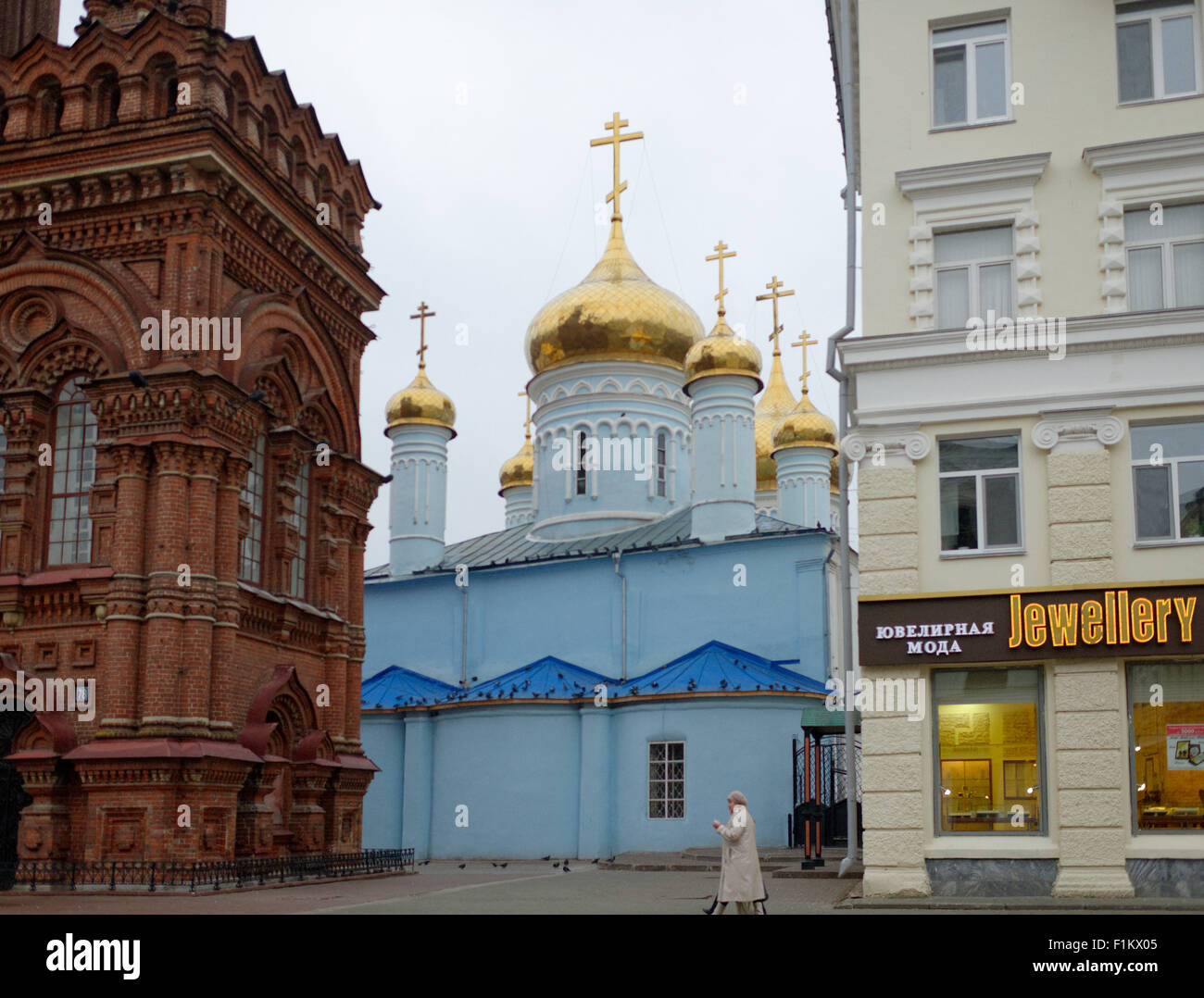 Golden domes over a blue church on a drab day in Kazan, Tartarstan ...