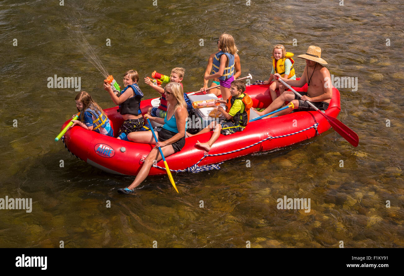 Family floating the Boise River on a summer day. Boise River Greenbelt ...