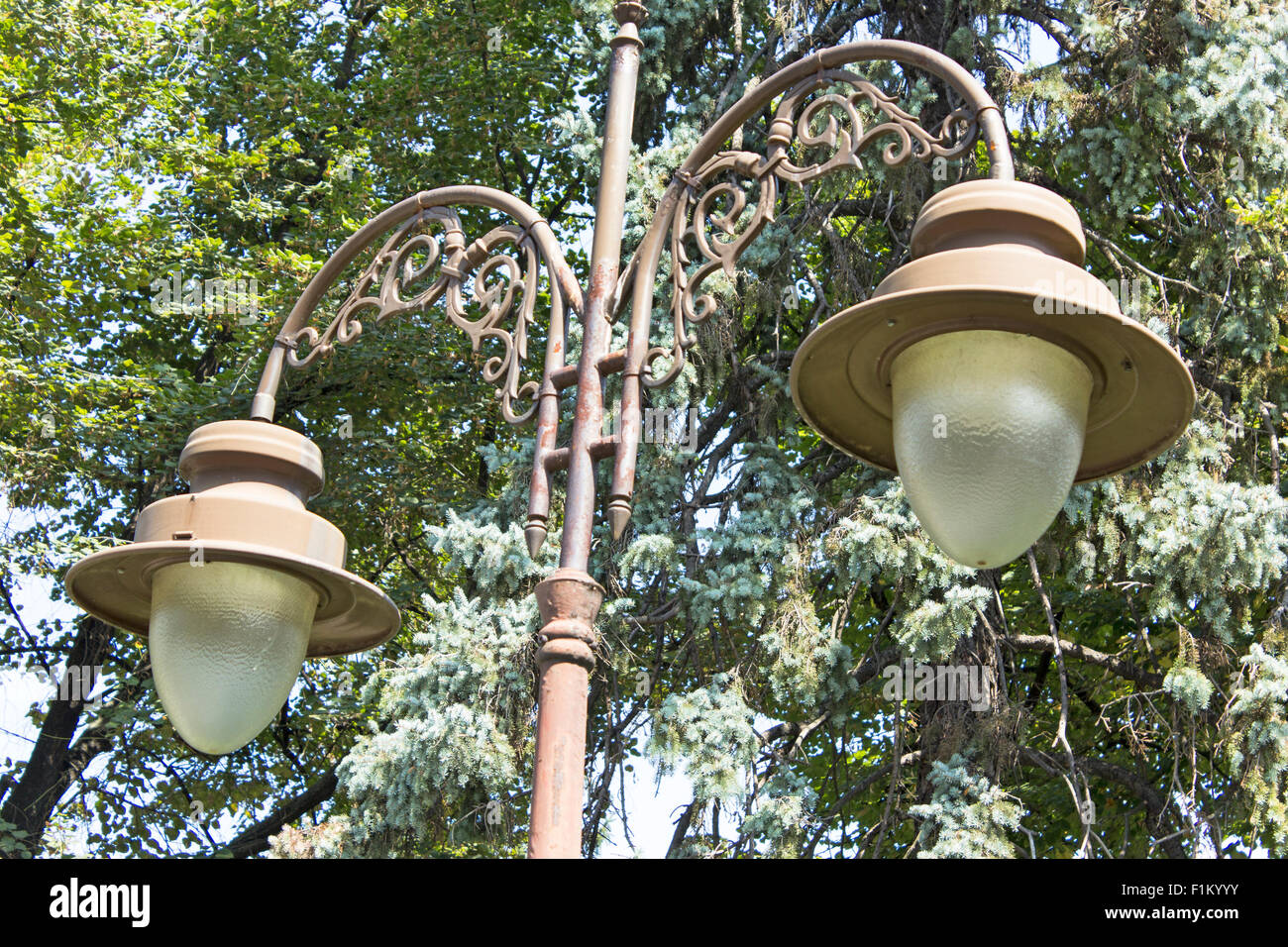 Vintage street lamp in the park Stock Photo - Alamy
