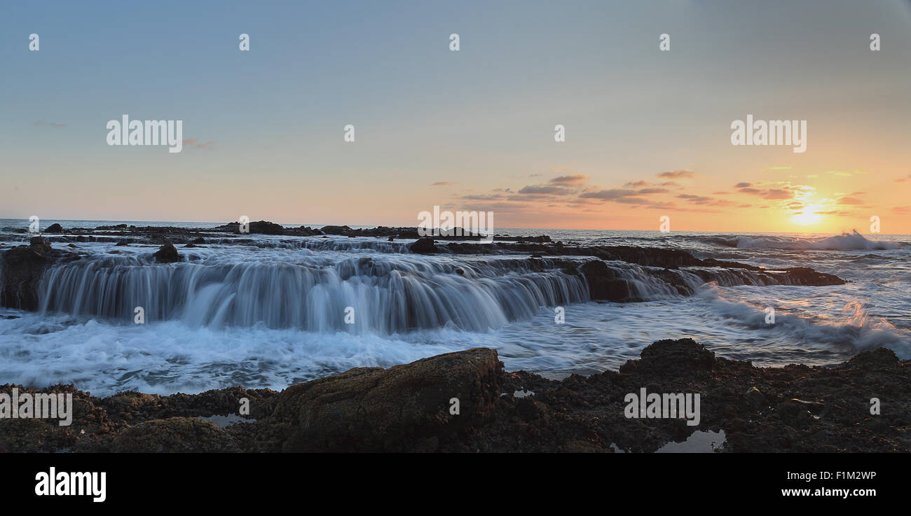 Panoramic of Victoria beach rocks with water flowing into the ocean at ...