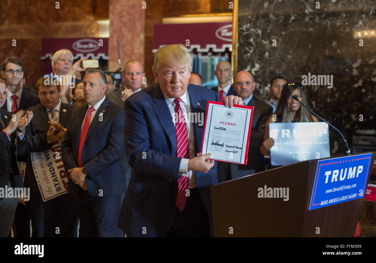 New York, New York, USA. 3rd Sep, 2015. DONALD TRUMP holds up the ...