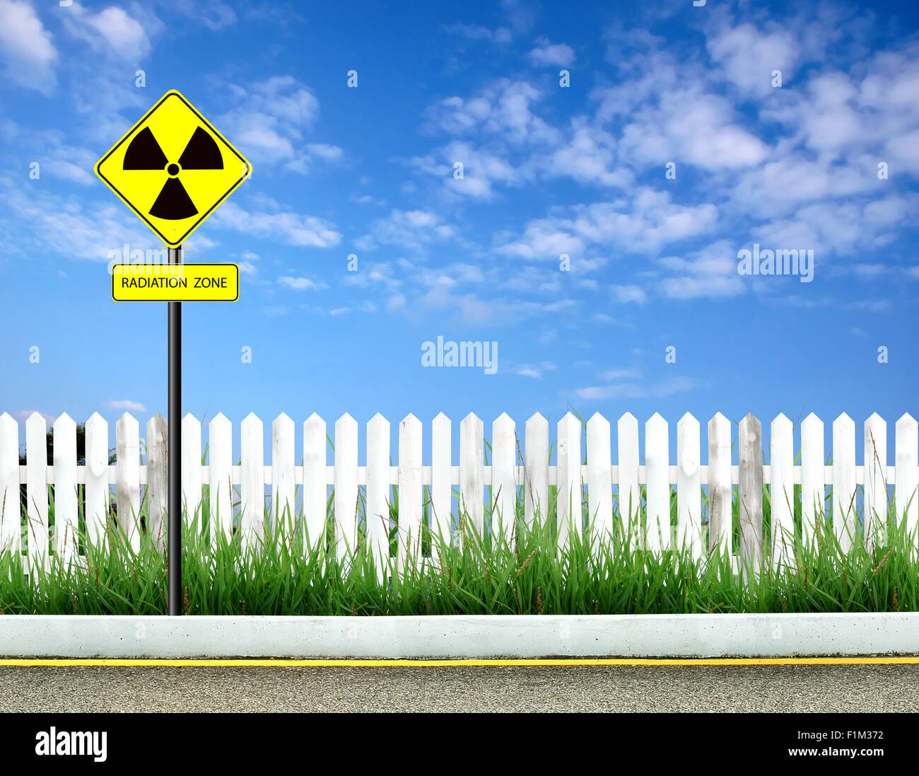 nuclear radiation warning symbol with blue sky Stock Photo - Alamy