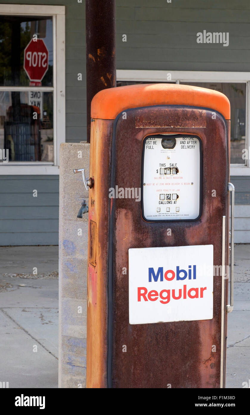 Old rusty gas petrol pump in front of old store in Bertram Texas Stock ...