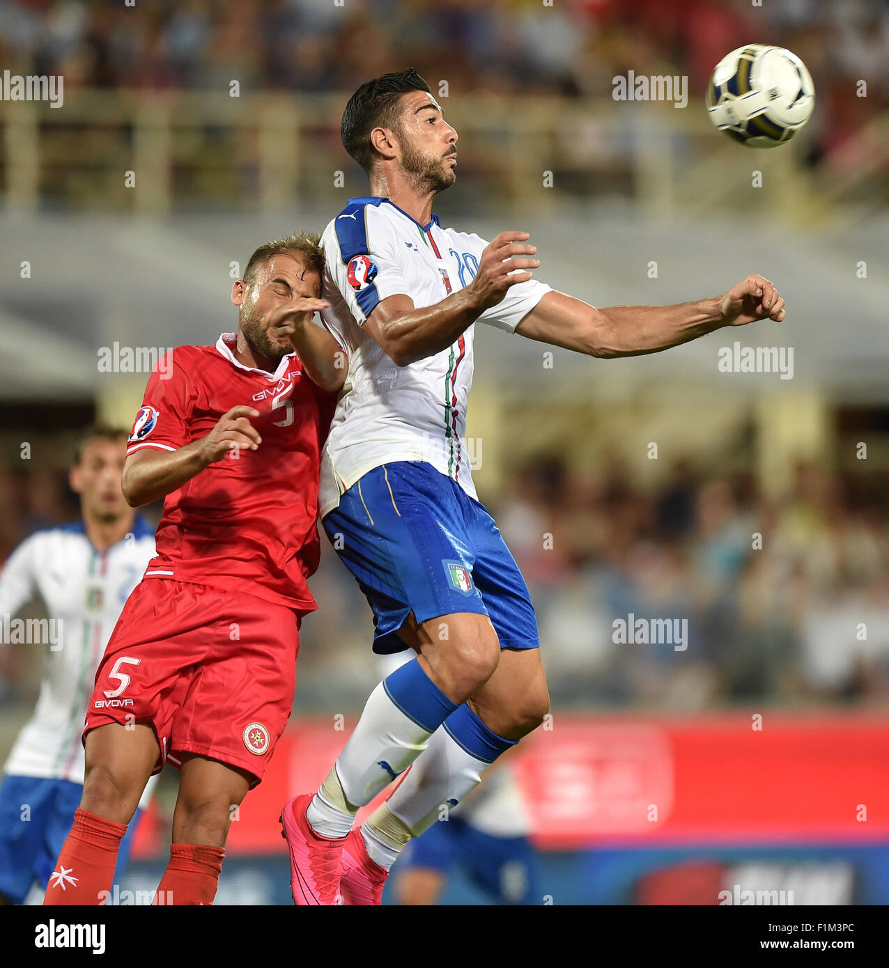 Florence, Italy. 3rd Sep, 2015. Graziano Pelle (R) of Italy vies with ...