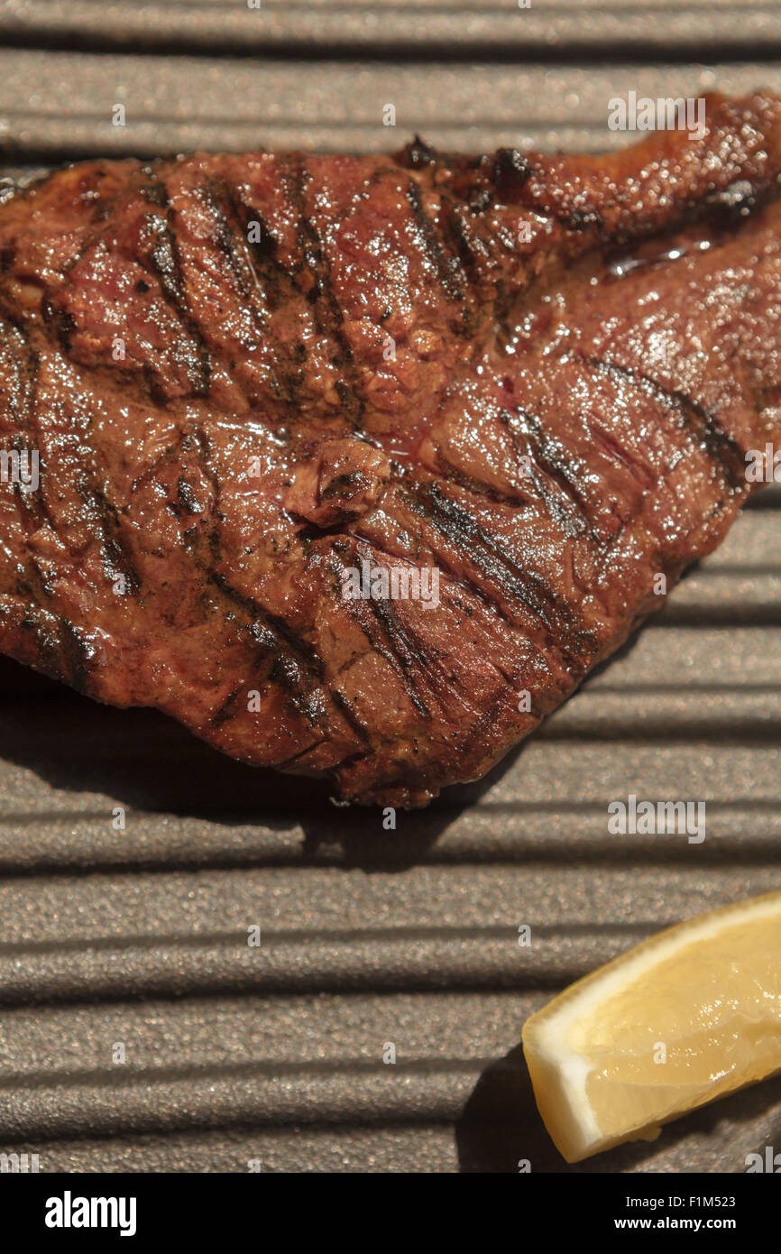 Beef steak and lemon Stock Photo - Alamy