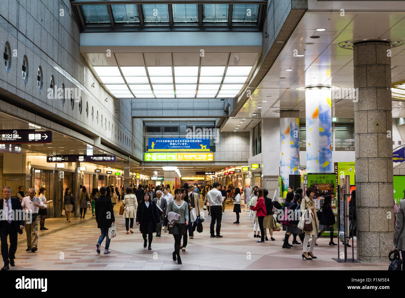Japan, Osaka. Looking along Shinsaibashi underground railway station ...