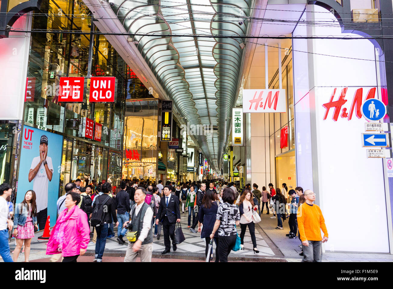 Japan, Osaka. Looking along Shinsaibashi Suji covered shopping street ...