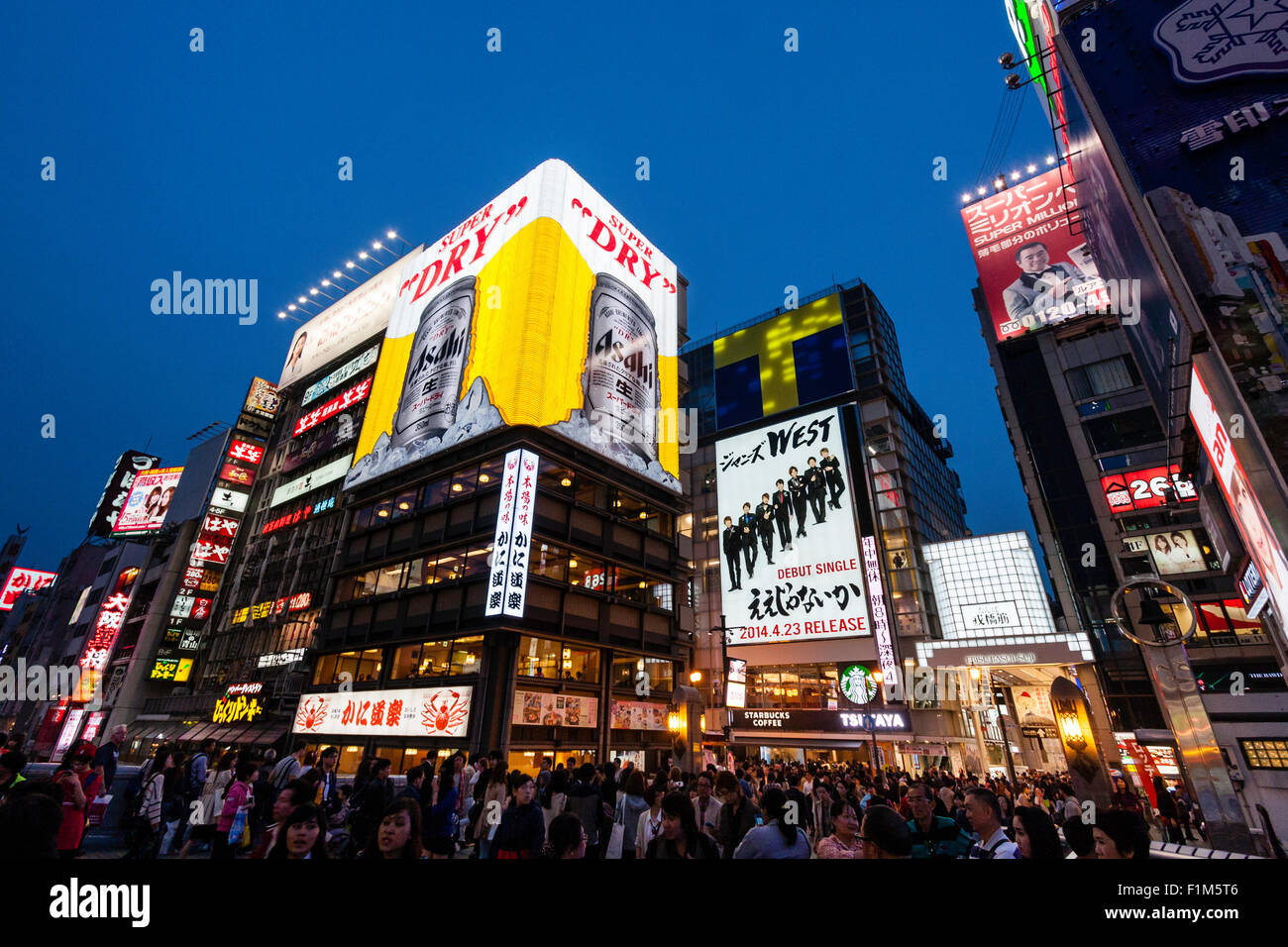 Osaka. Dotonbori, Ebisubashi bridge. Night. Famous massive Asahi beer ...