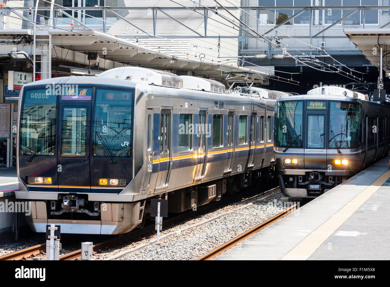 Japan, JR Amagaski station, with front of two Electric railcar type ...