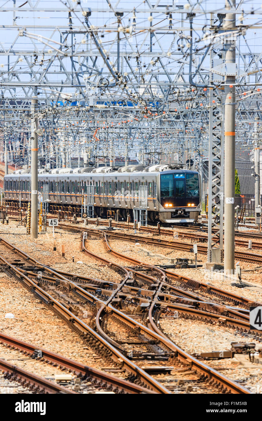 Japan, JR Amagaski station. Clutter of main lines with Eelectric ...