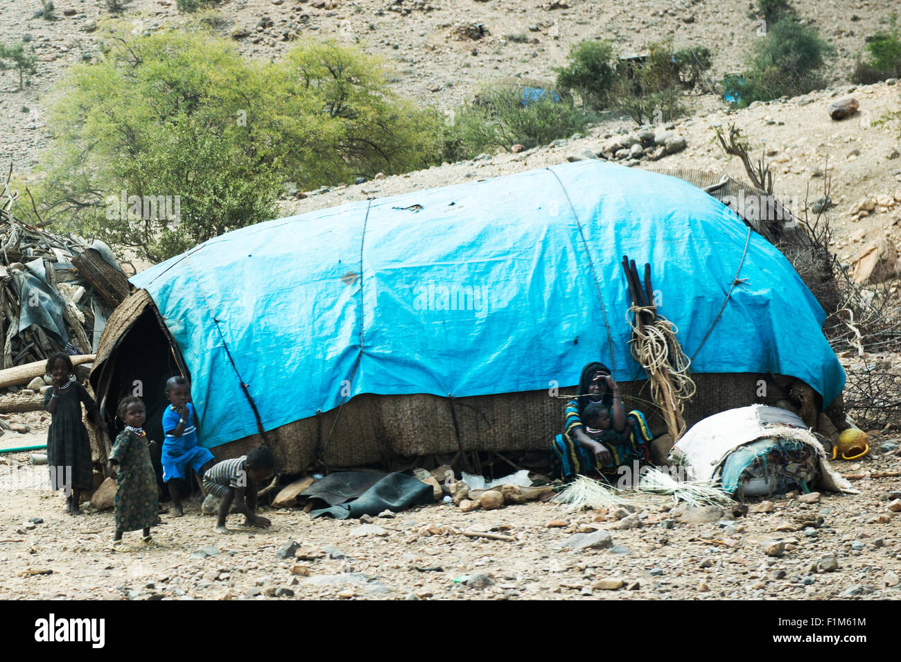 An Afar family by their home in a small village in The Danakil ...