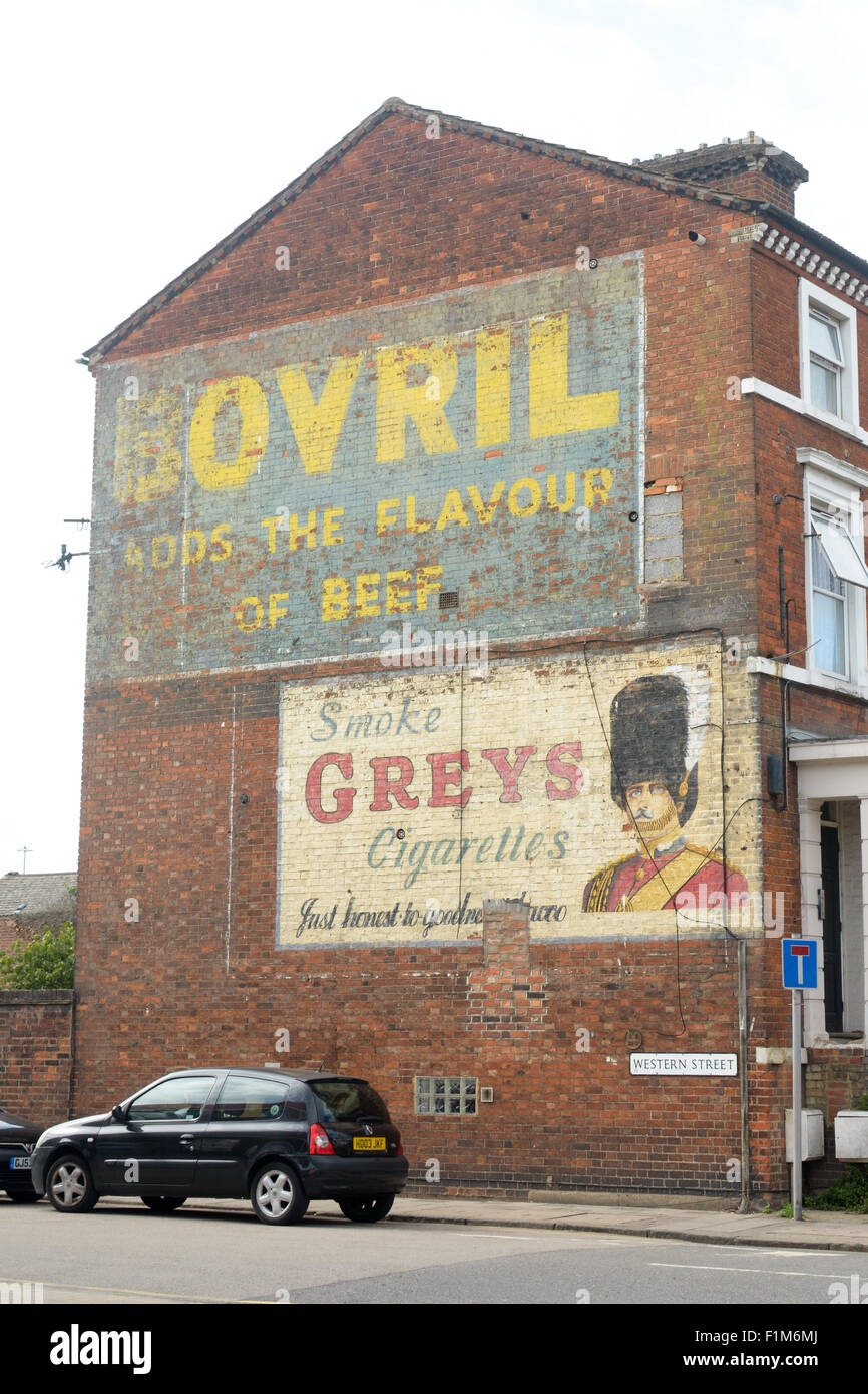 Vintage large painted advertising signs for Bovril beef drink and Greys ...