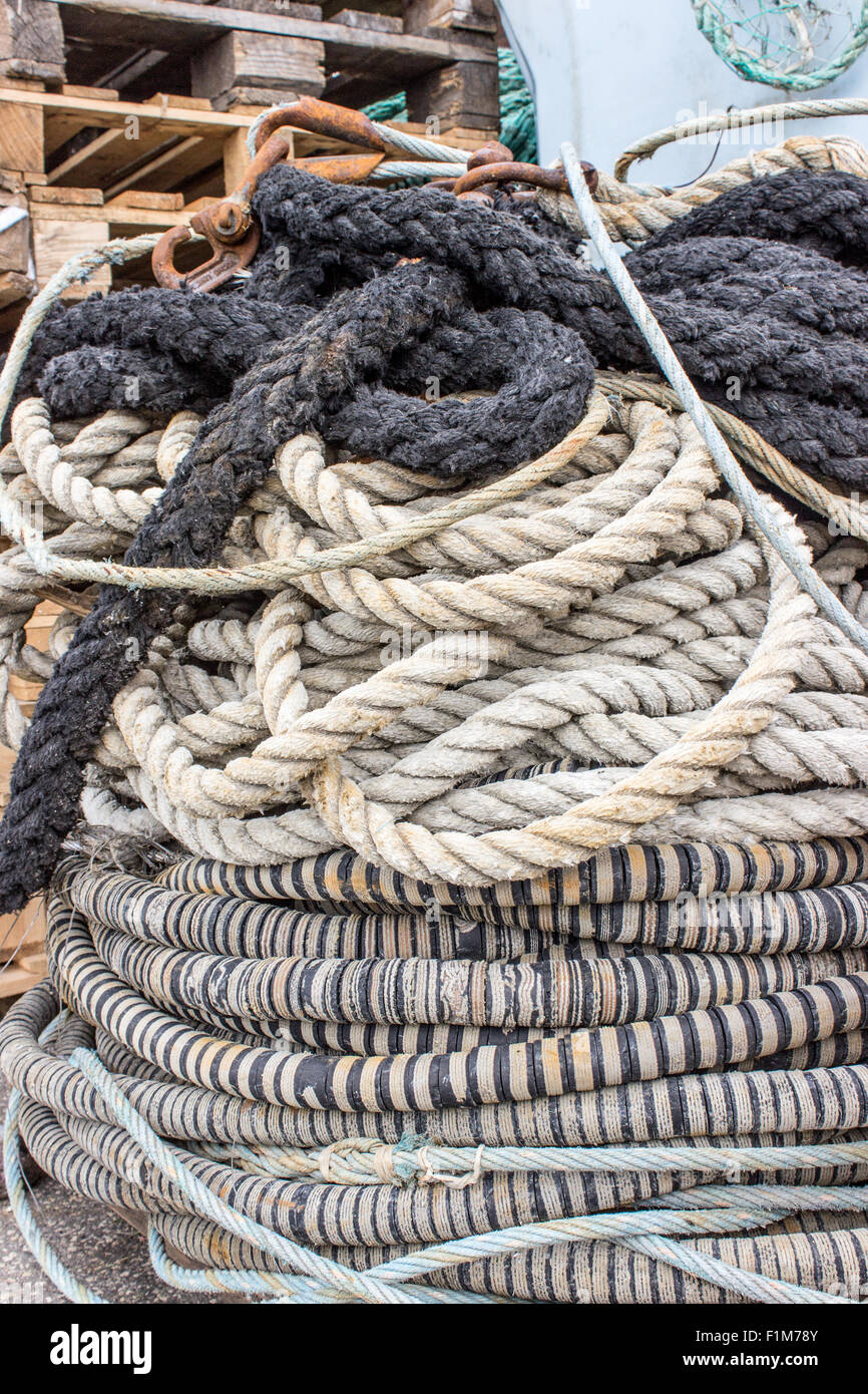 several ship ropes and wooden pallets Stock Photo - Alamy