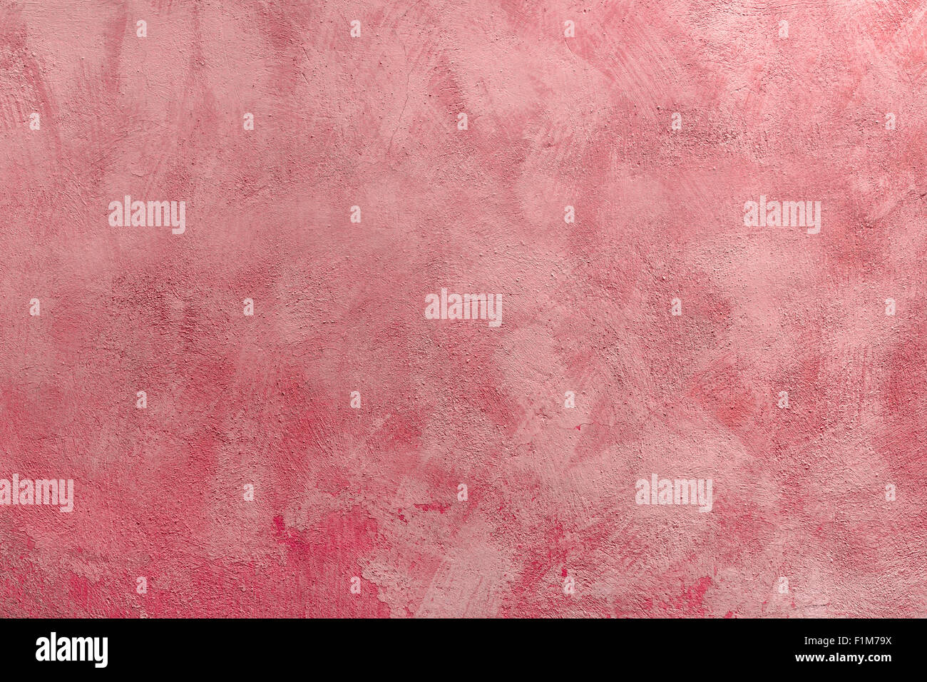 Front view of a wall decorated with pink stucco Stock Photo - Alamy