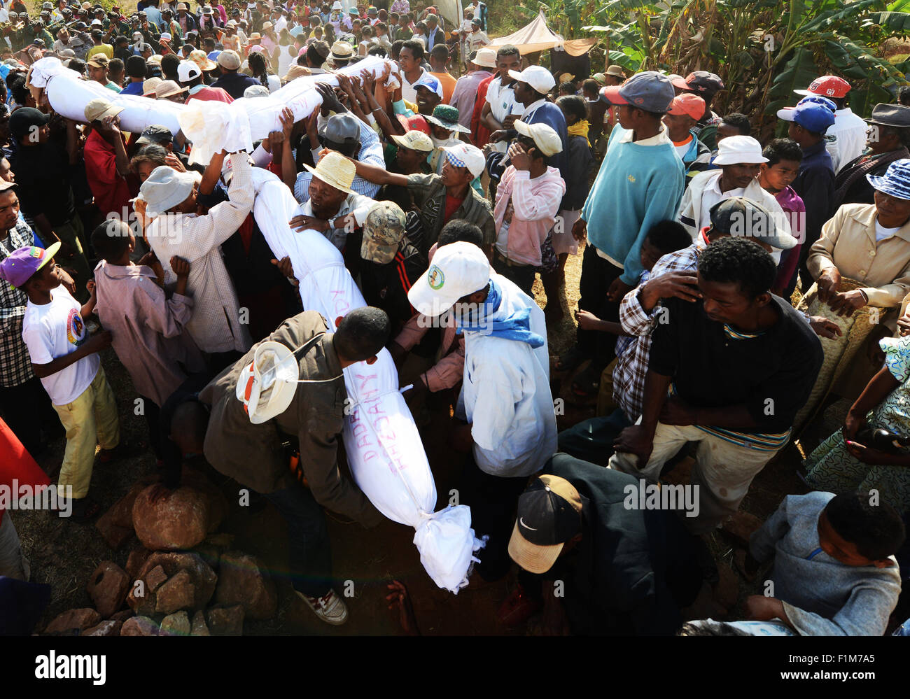 Dancing with the dead. Famadihana ( turning of the bones ) ceremony in ...